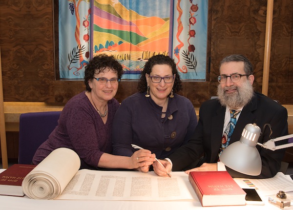 Hundreds scribe new Torah